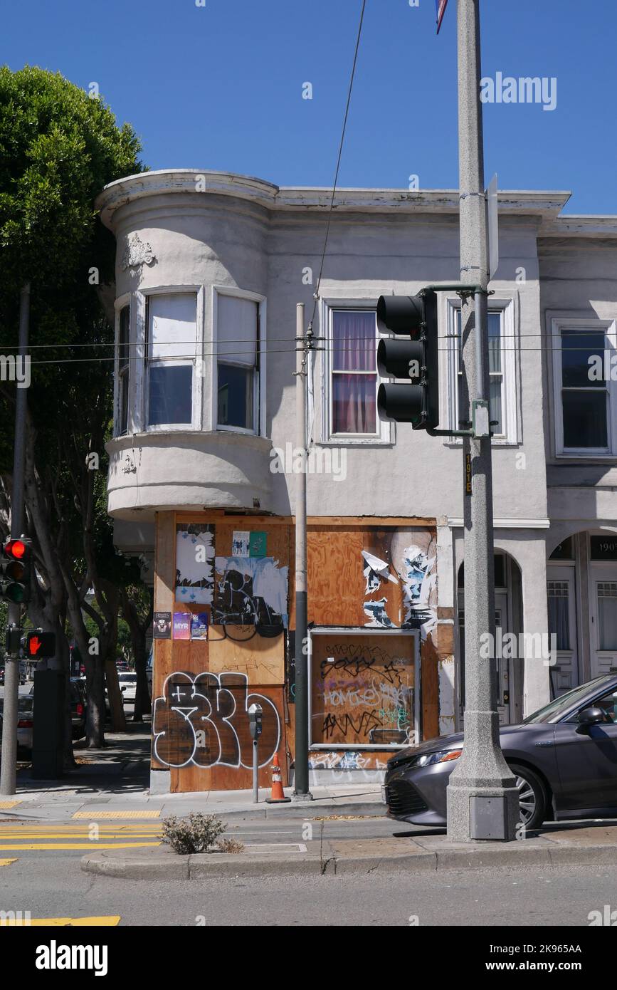 A two story building with a ground floor shop front that has been ...