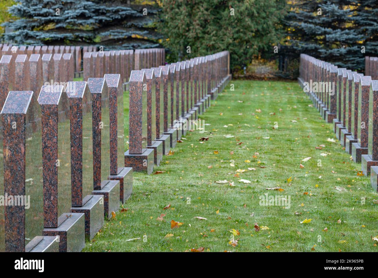 alley of stone slabs in the cemetery. empty tombstone in the cemetery ...