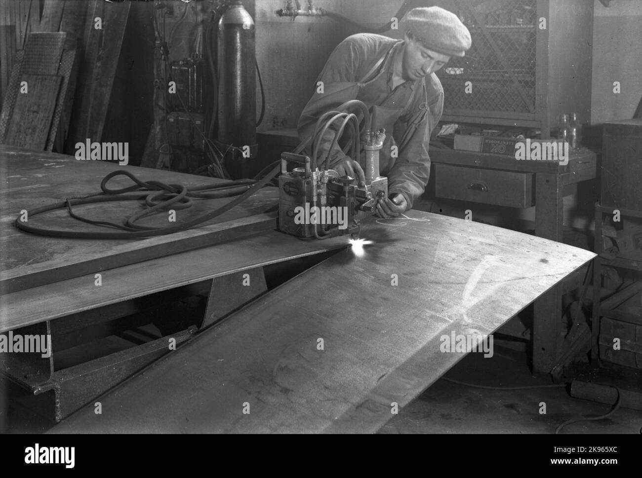 Sheet is cut with cutting machine section. P Stock Photo - Alamy