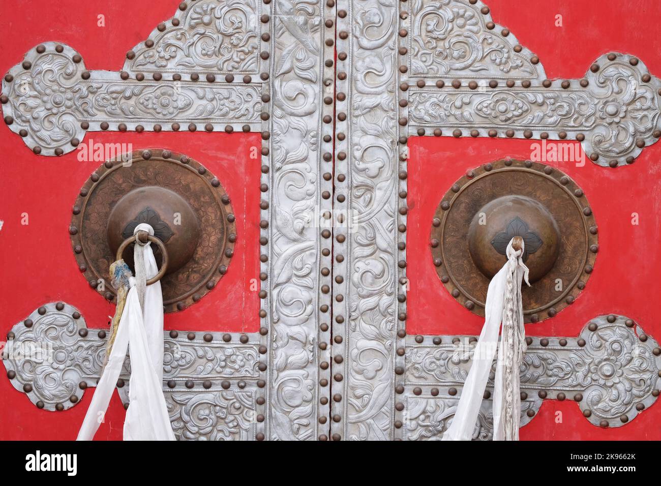 A closeup of Tibetan temple doors, Buddhist metal gates in Ta'er temple ...