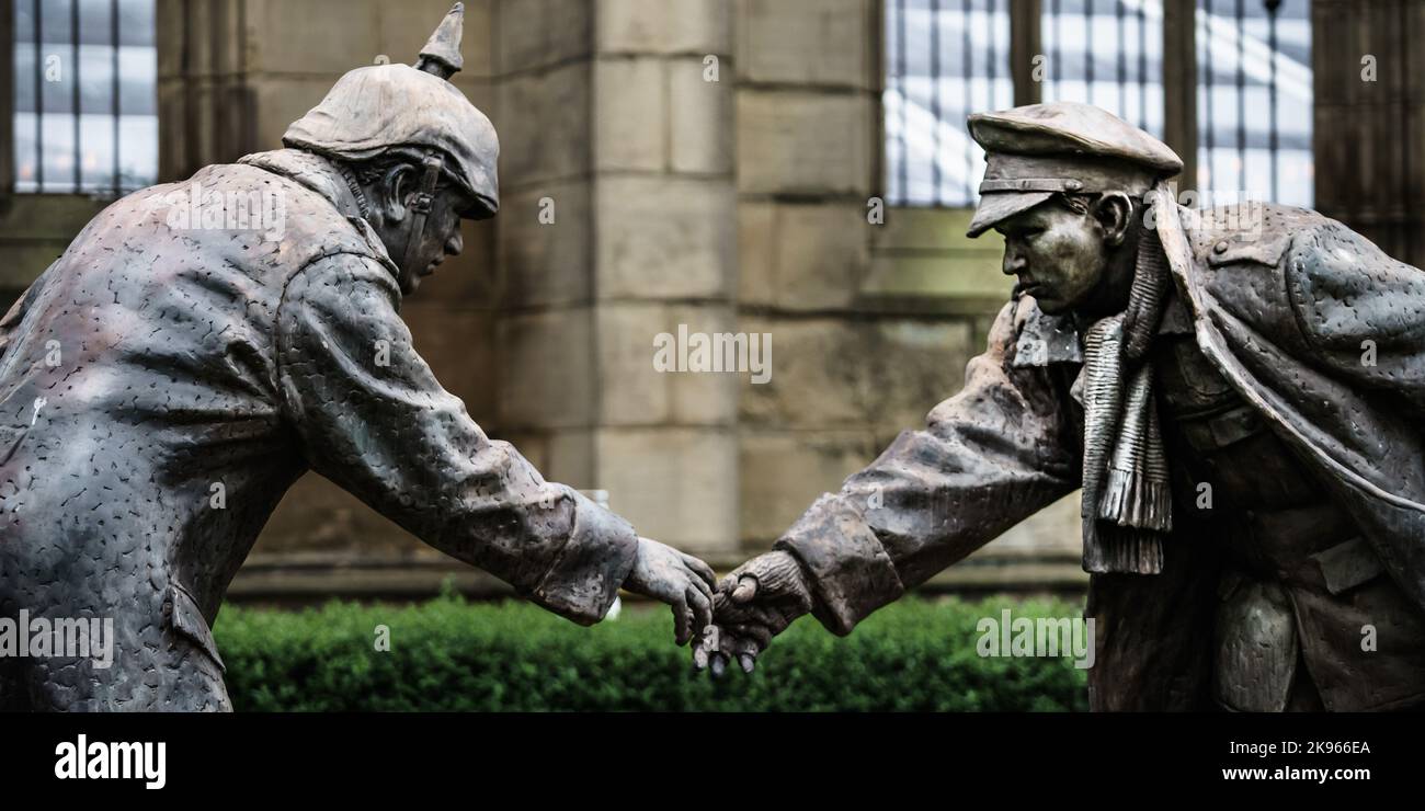 The Truce statue of two men shaking hands, Liverpool, United Kingdom ...