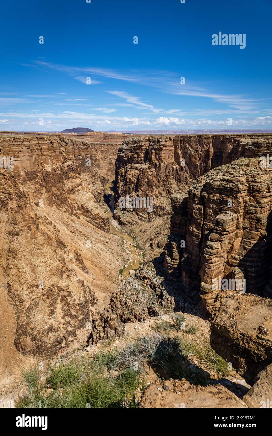 Final ends of the Grand Canyon with high craggy brown rocks near the ...