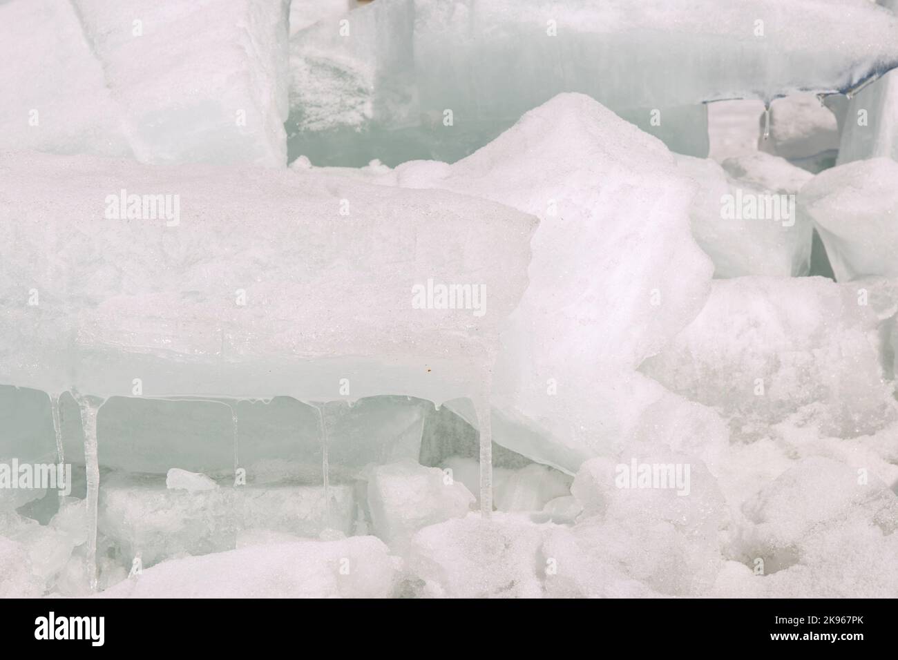 Frosty ice icicles winter background Stock Photo - Alamy