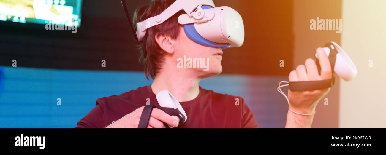 vr game and virtual reality. man gamer fun playing on futuristic ...