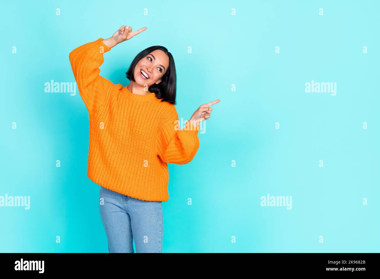 Photo of pretty gorgeous woman with straight hairdo dressed orange ...
