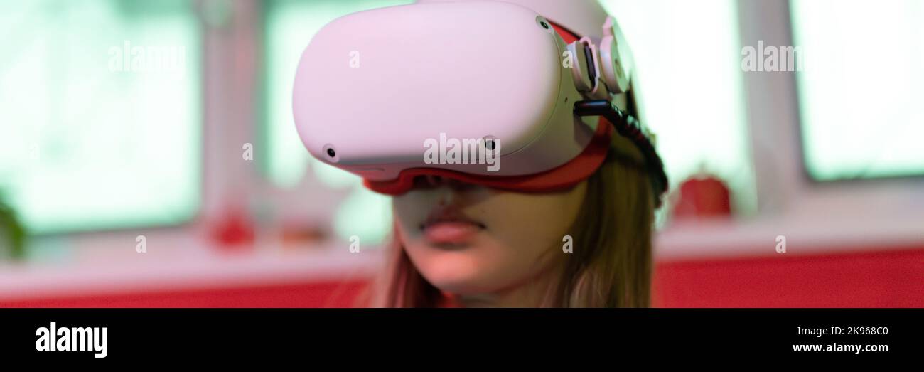 vr game and virtual reality. kid girl gamer eight years old fun playing ...