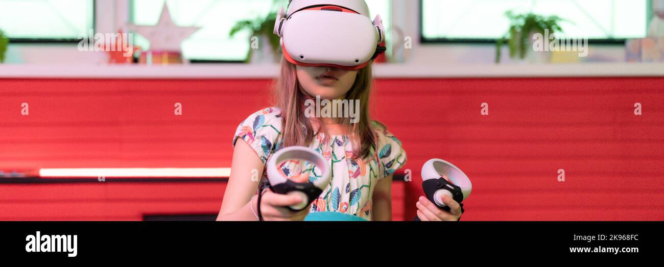 vr game and virtual reality. kid girl gamer eight years old fun playing ...