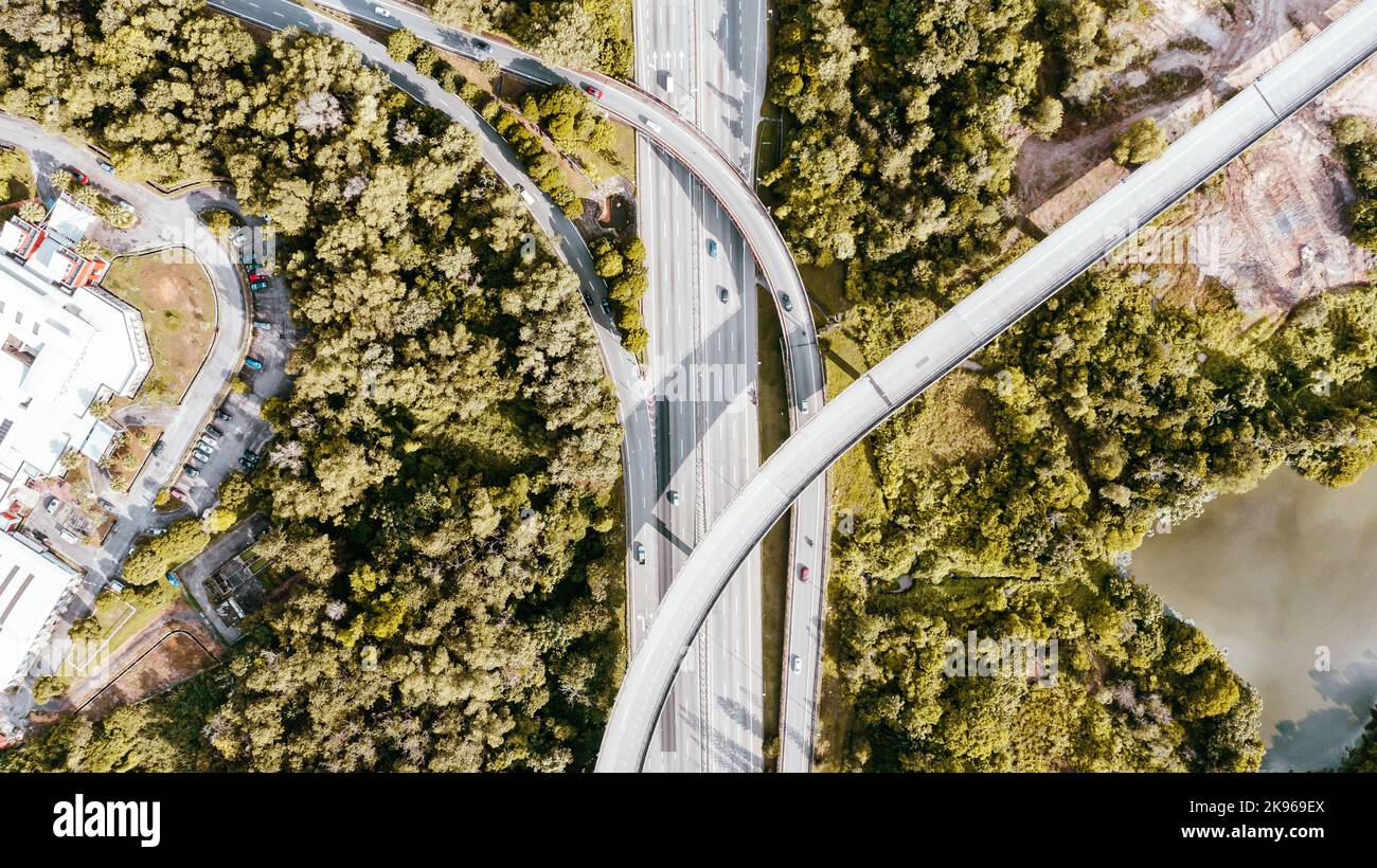 Aerial view directly above a six lane highway. Top view of asphalt road ...