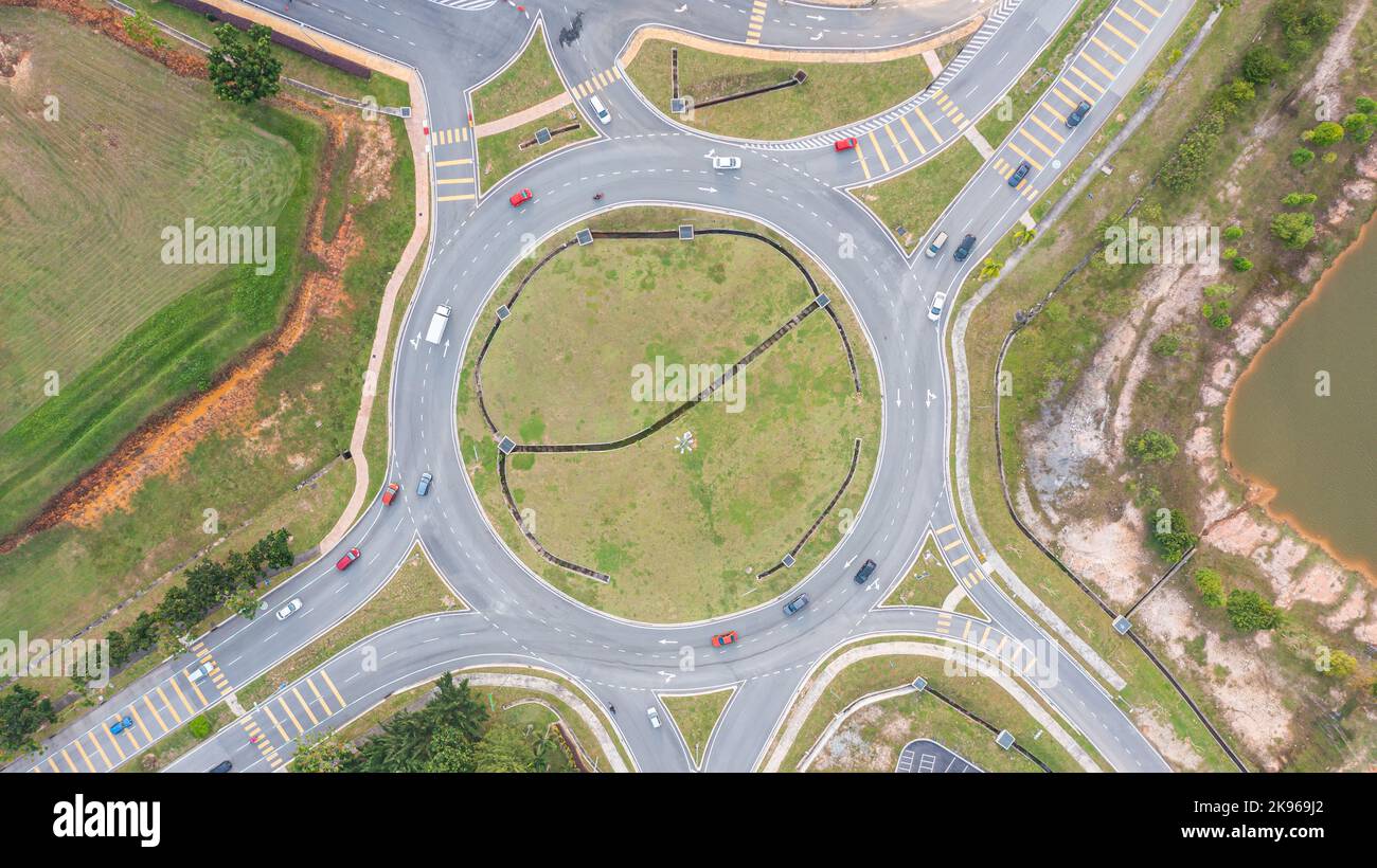 Aerial top down view of traffic roundabout on a main road. Aerial view ...
