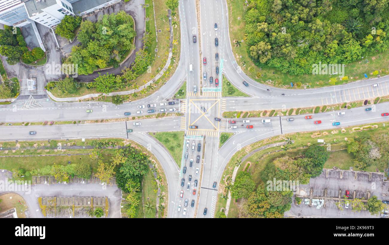 Traffic junctions, modern city. View from above to busy road junction ...