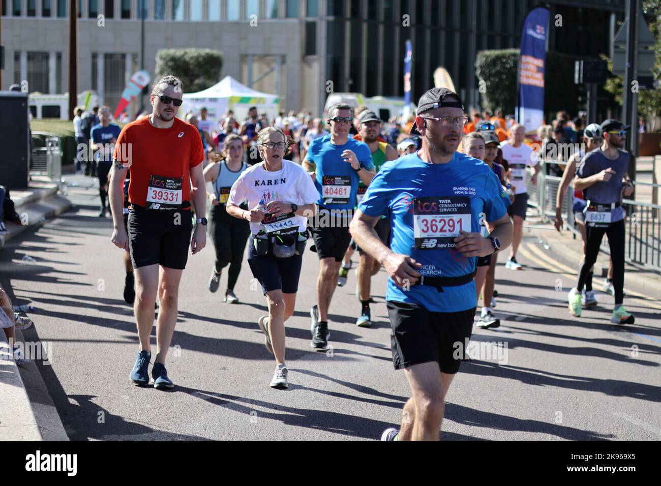 London Marathon 2022, October 02. Runners at Canary Wharf, Isle of Dogs ...