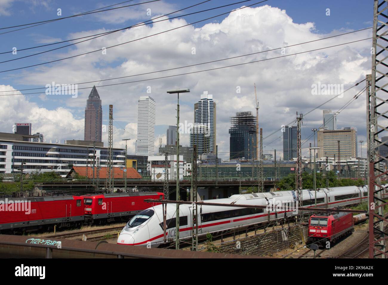 A german high speed train in front of the skyline of Frankfurt Stock ...