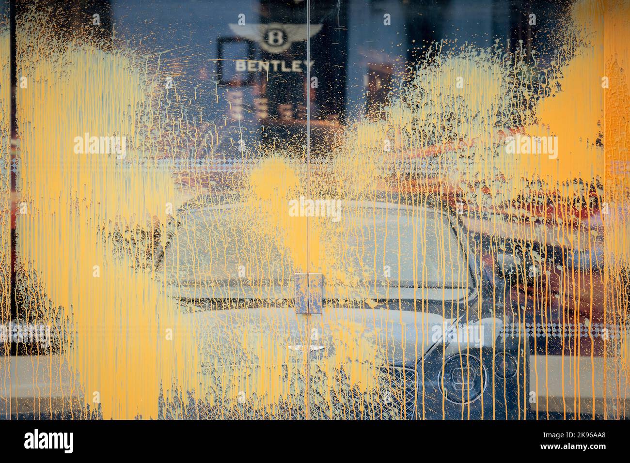 The aftermath of a targeted dye attack on the front windows of Bentley ...