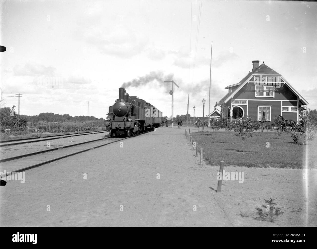 TJ Lok 1 by train at the station. The station was built in 1906. The ...
