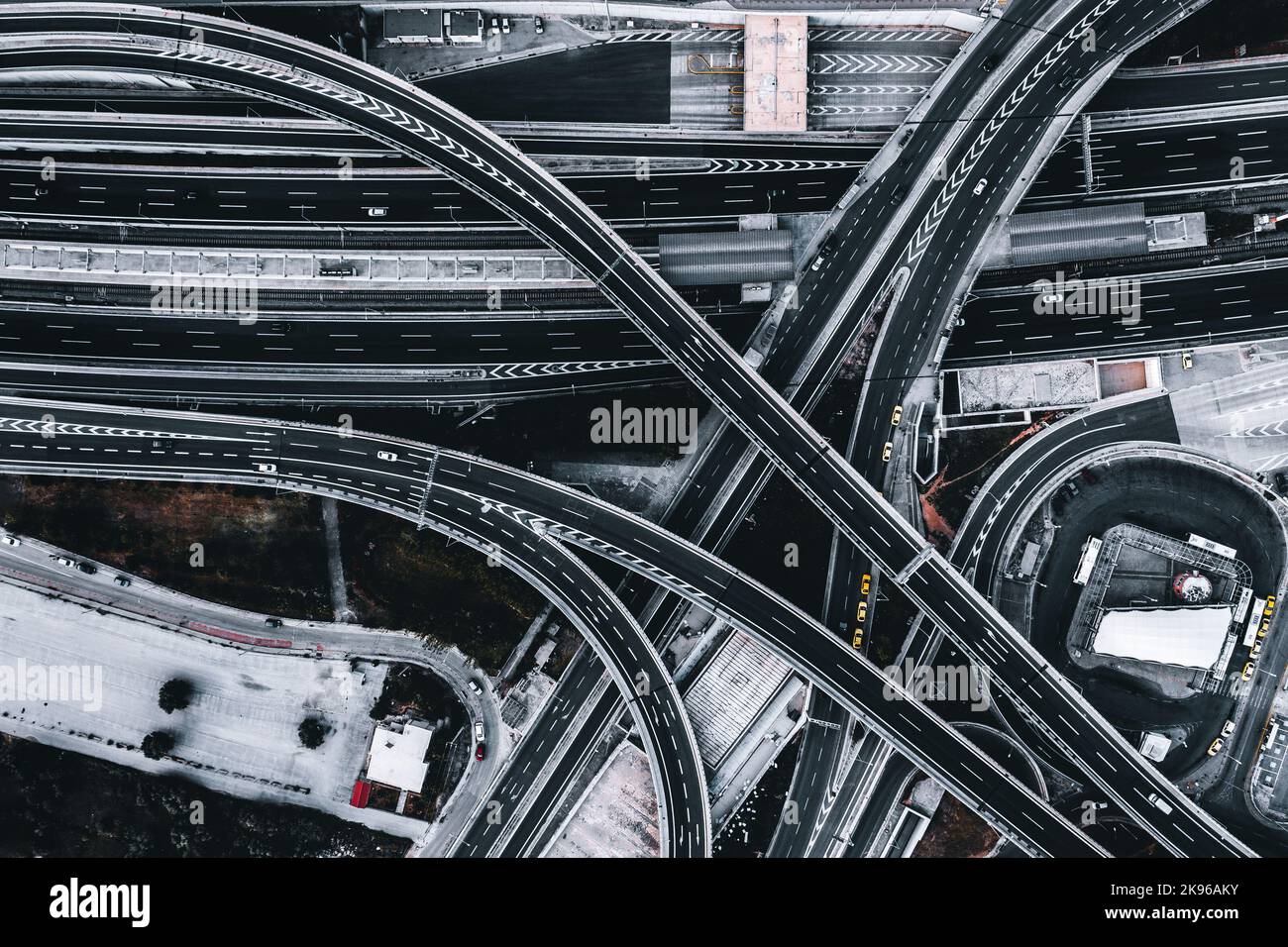 An aerial view of an empty intersection with crossing roads and few ...