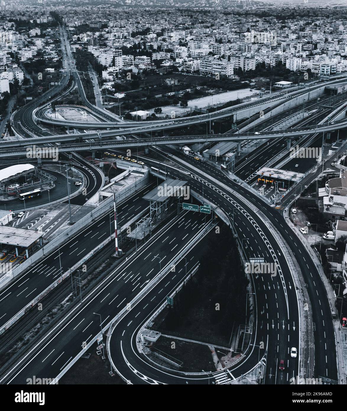 A vertical aerial view of an empty intersection with crossing roads in ...