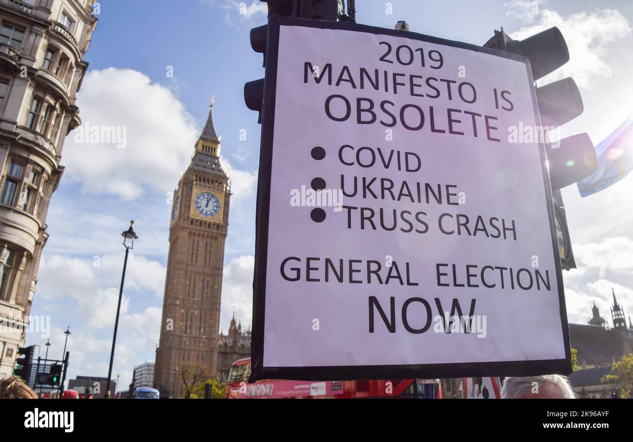 London, England, UK. 26th Oct, 2022. A protester holds a placard ...