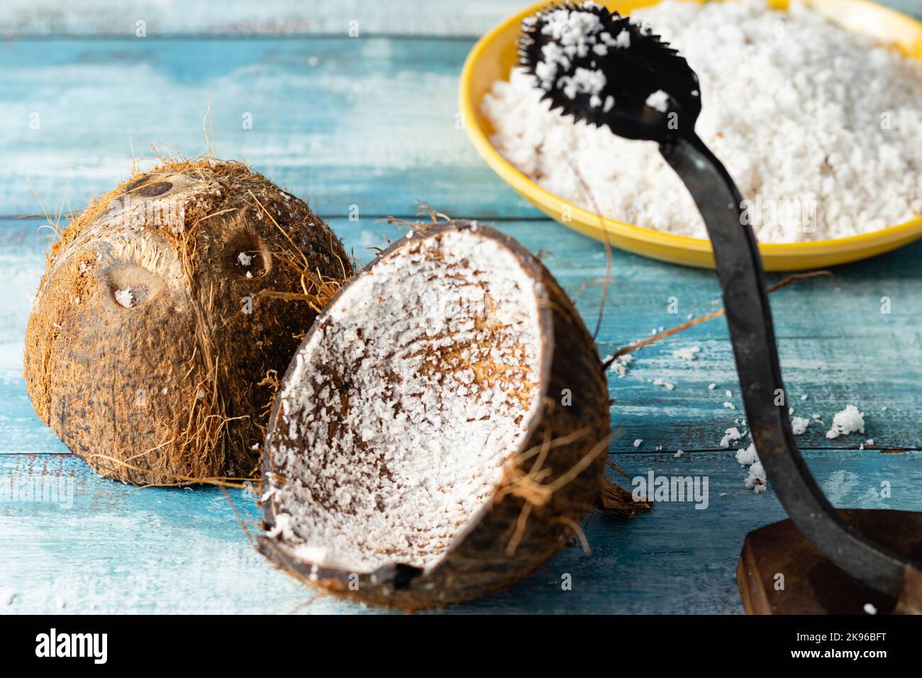 Shells and ground ground with scraper on a blue wooden table Stock ...