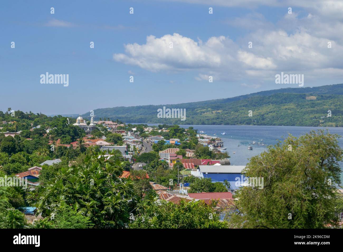 Landscape view of Larantuka city and the strait separating it from ...