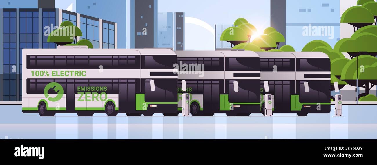 electric buses charging parking at the charger station with a plug in ...