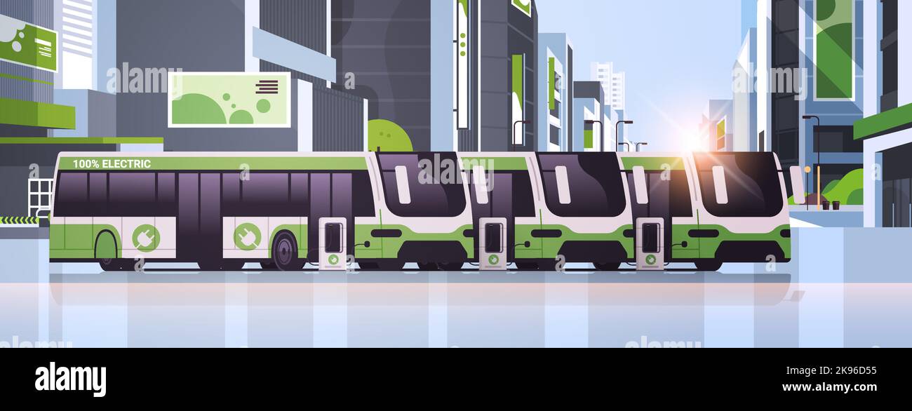 electric buses charging parking at the charger station with a plug in ...