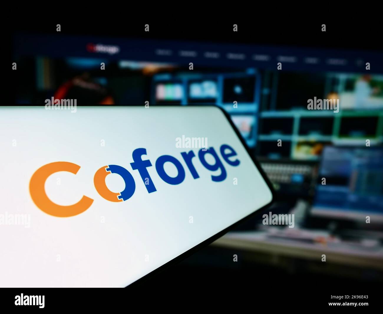 Cellphone with logo of Indian information technology company Coforge ...