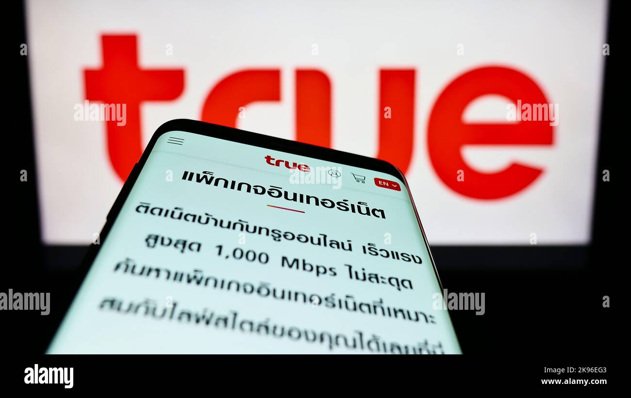 Mobile phone with webpage of Thai telecommunications company True ...