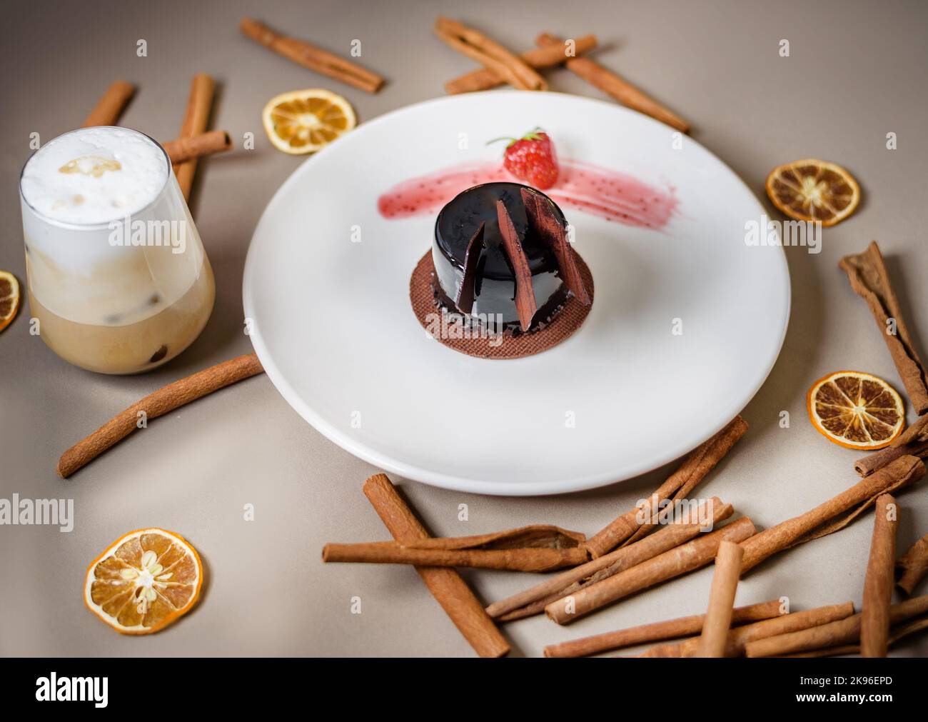 A sweet chocolate brownie served on the white plate Stock Photo - Alamy
