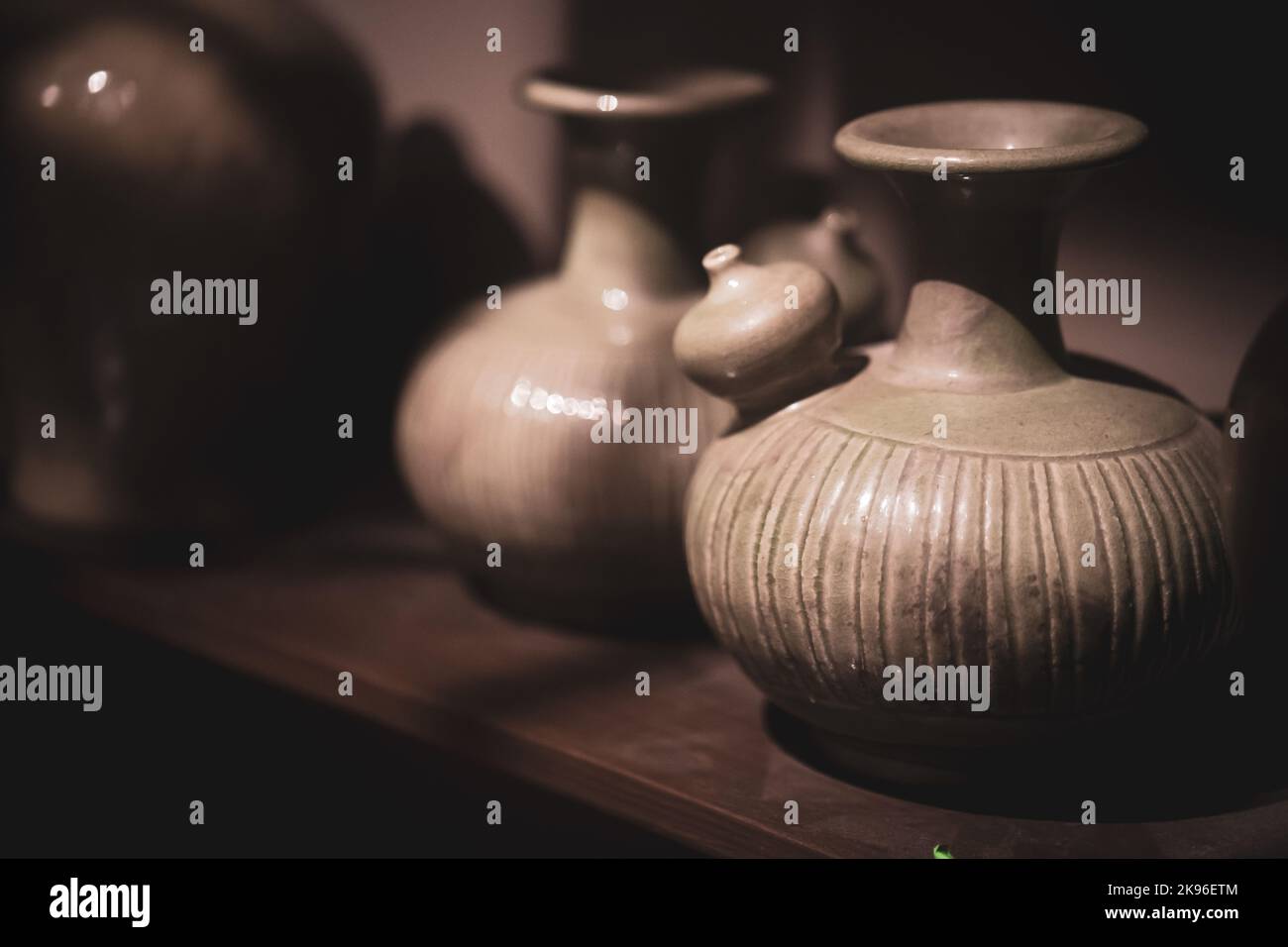 A closeup of ancient vases on a shelf at the exhibit of the National ...