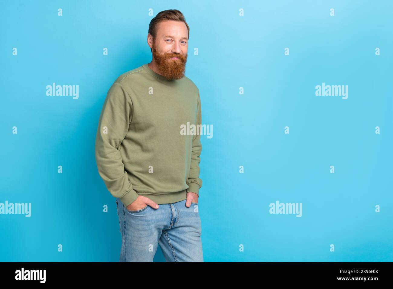 Photo of positive optimistic handsome guy with red hairstyle dressed ...