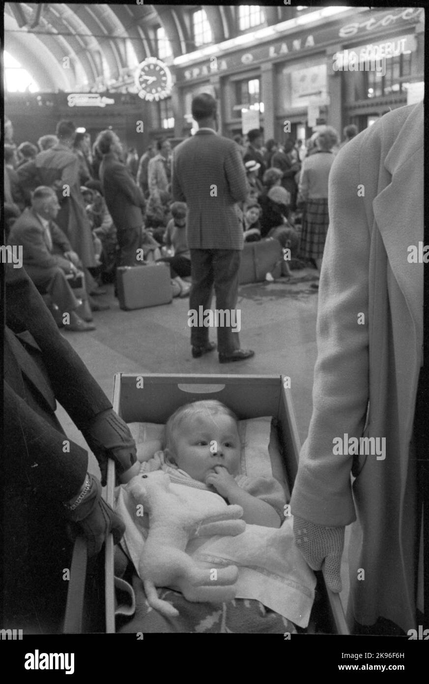Travelers are waiting for trains. The photo taken at the height of the ...
