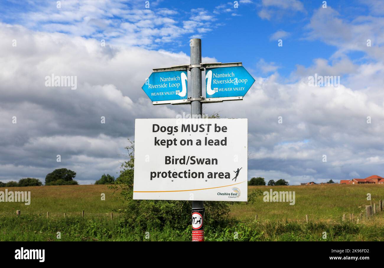 A sign for the Nantwich Riverside Loop walk, next to the River Weaver ...