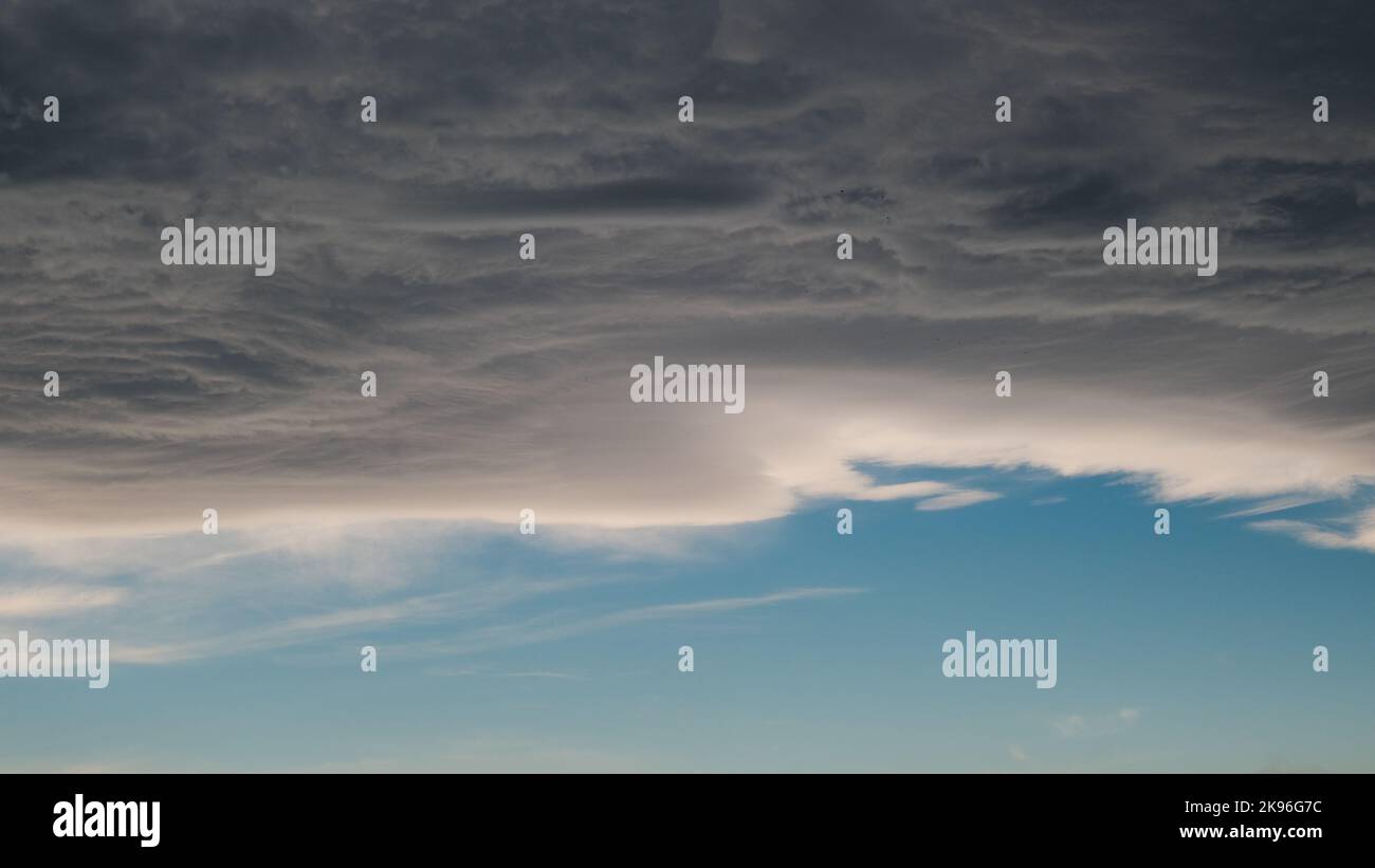 cloudy scary sky, pale white blue sky with scattered cumulus clouds ...