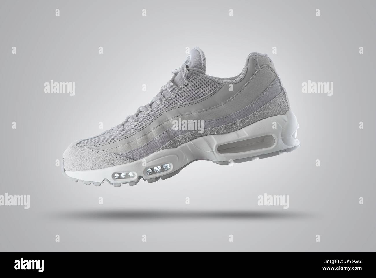 Light Gray sport sneaker, shoe on a gray gradient background, men's ...