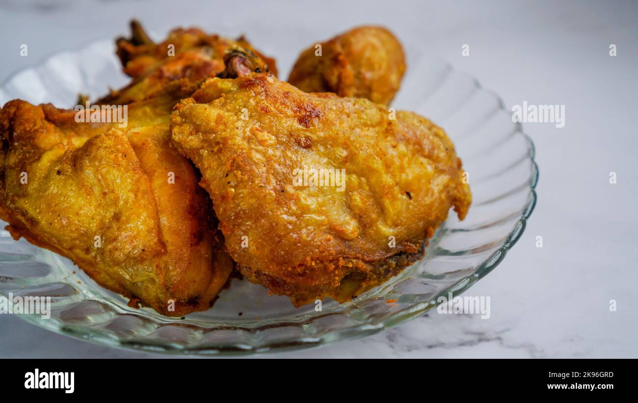 Ayam goreng kunyit or Turmeric fried chicken, deep fried chicken ...