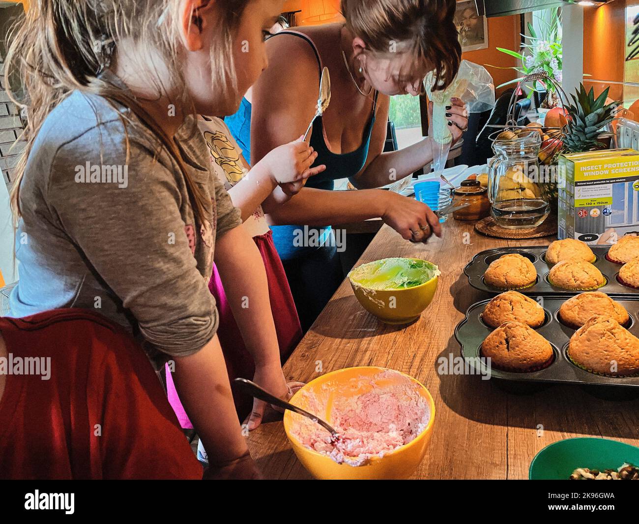Group of children baking cupcakes, preparing ingredients, toppings ...