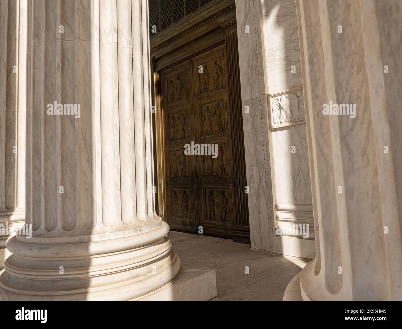 The bronze door at the entrance to the Supreme Court building with The ...