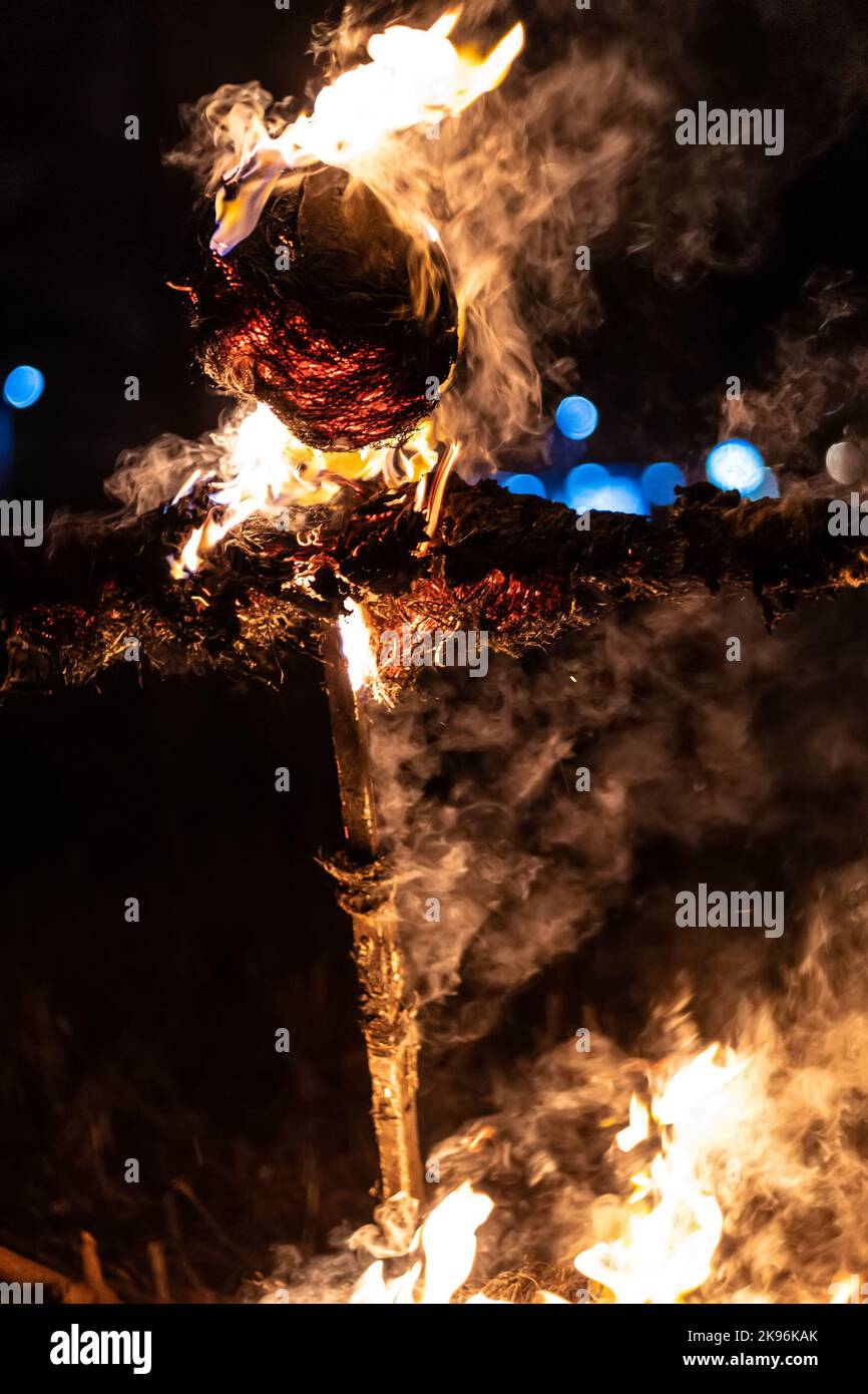 Scarecrow in festive fire Stock Photo - Alamy