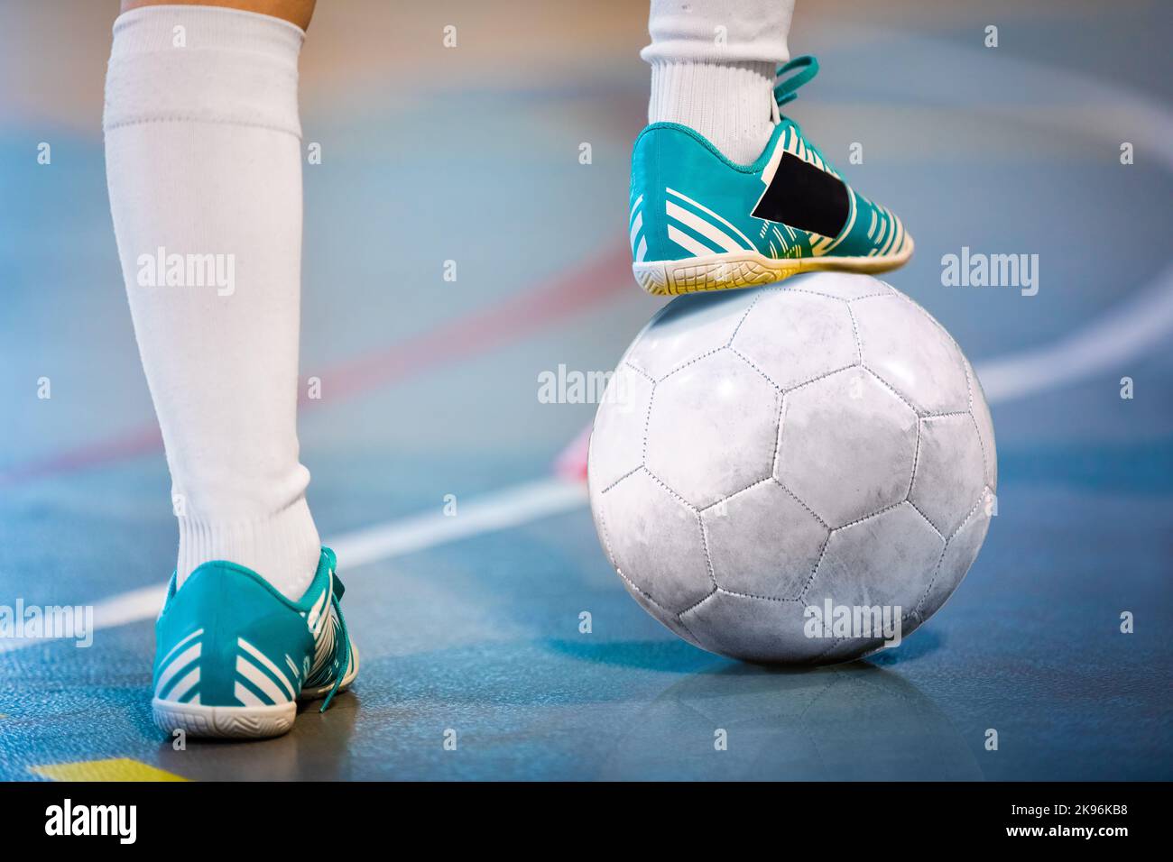 Boy in Soccer Clothes with Futsal Ball on Dribbling Drill. Kid on ...