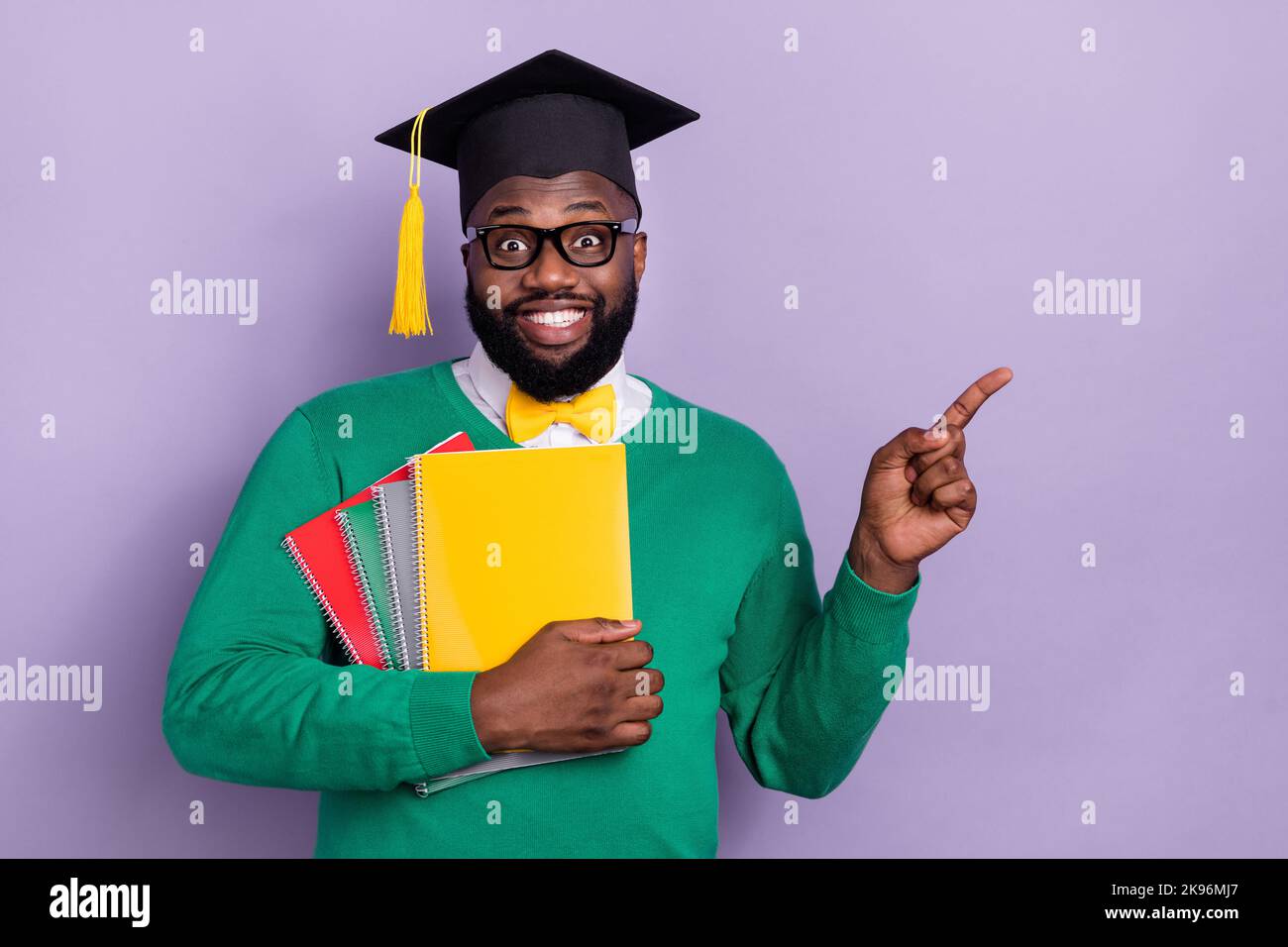 Portrait of excited student graduate from university promote recommend ...