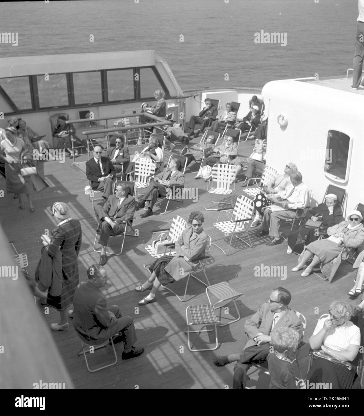 M/S Trelleborg, travelers in recliners on sun deck Stock Photo - Alamy
