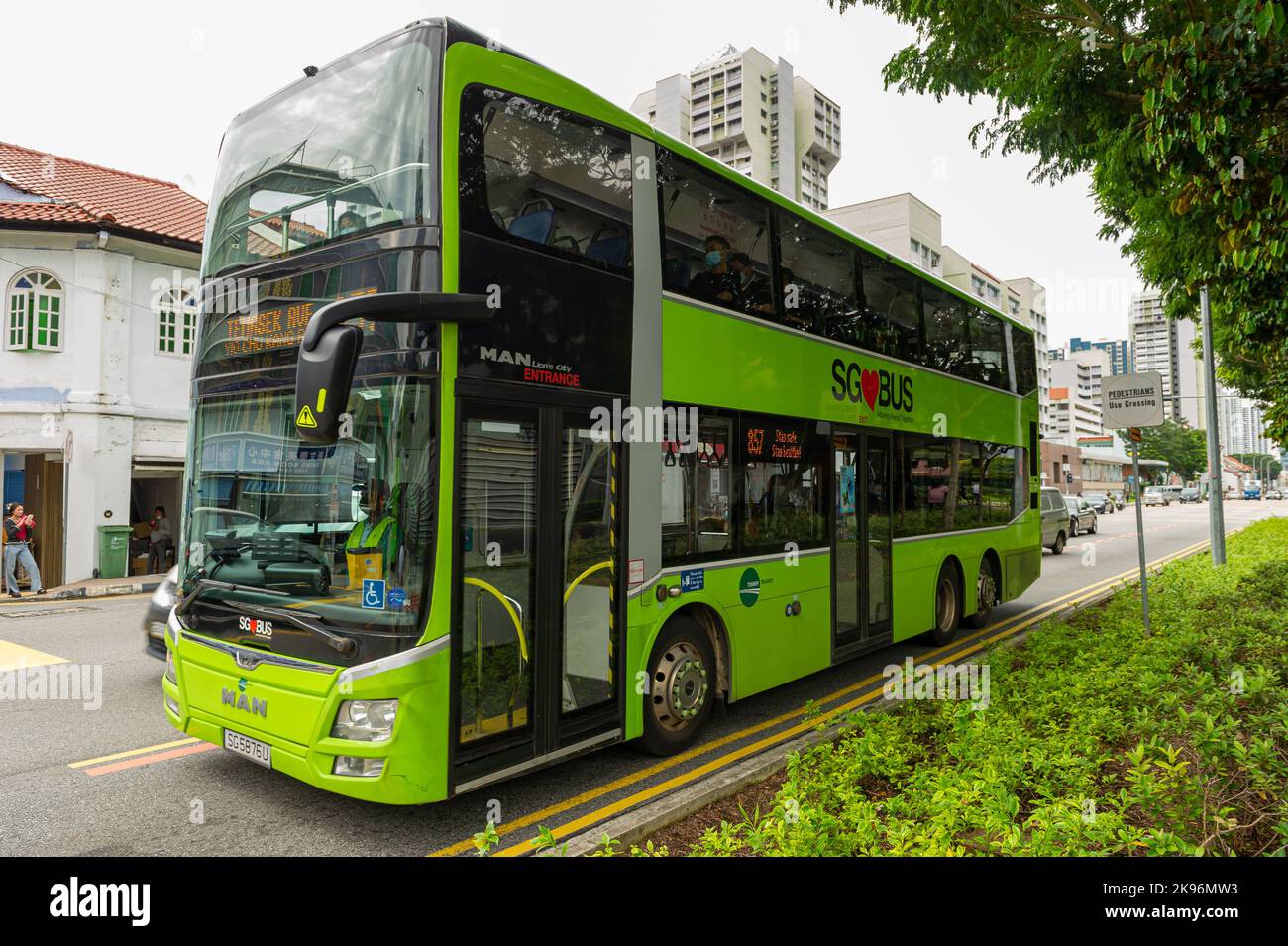 A passing bus on Jalan Besar in Singapore Stock Photo - Alamy