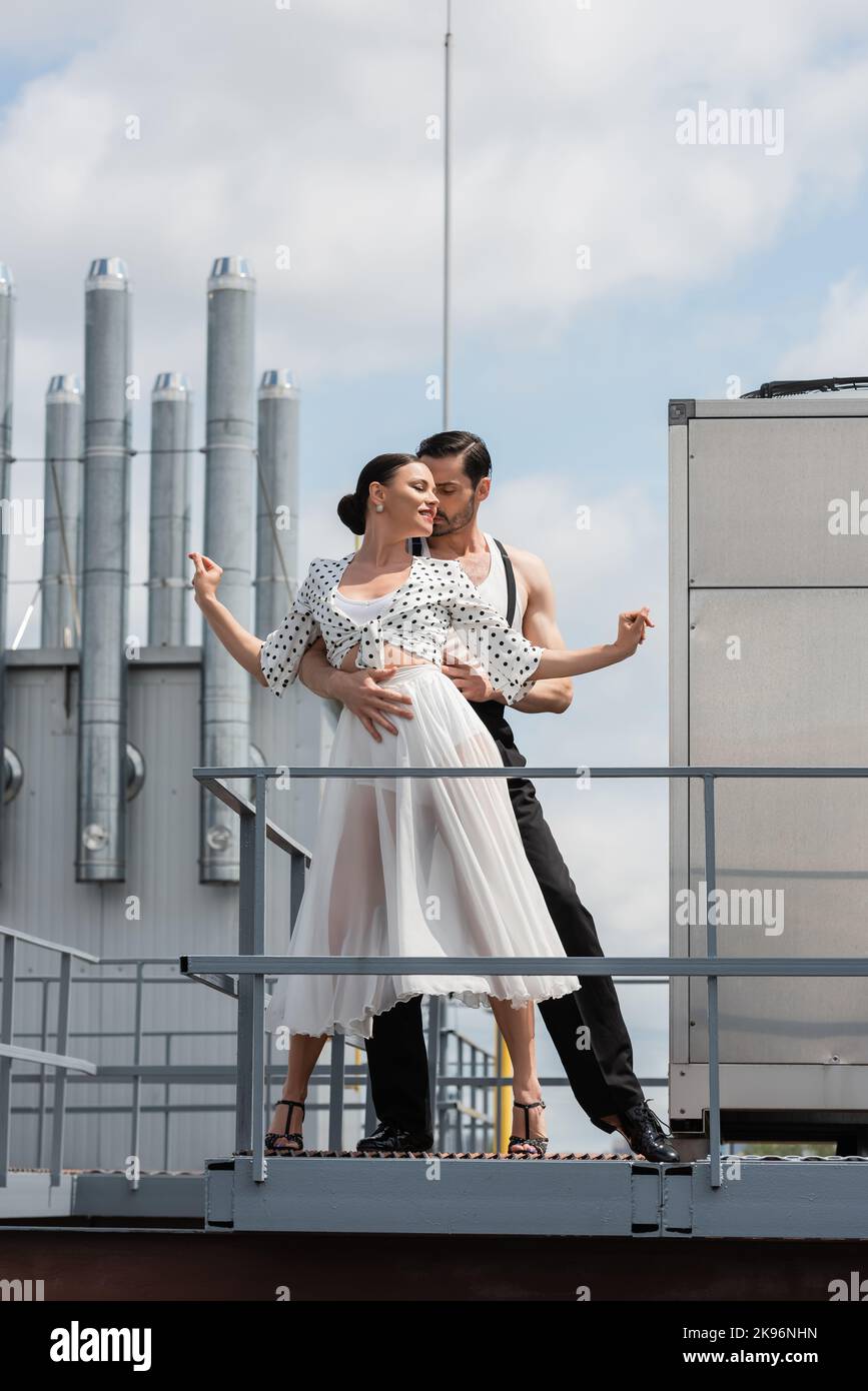 Smiling pair hugging dancing on hi-res stock photography and images - Alamy