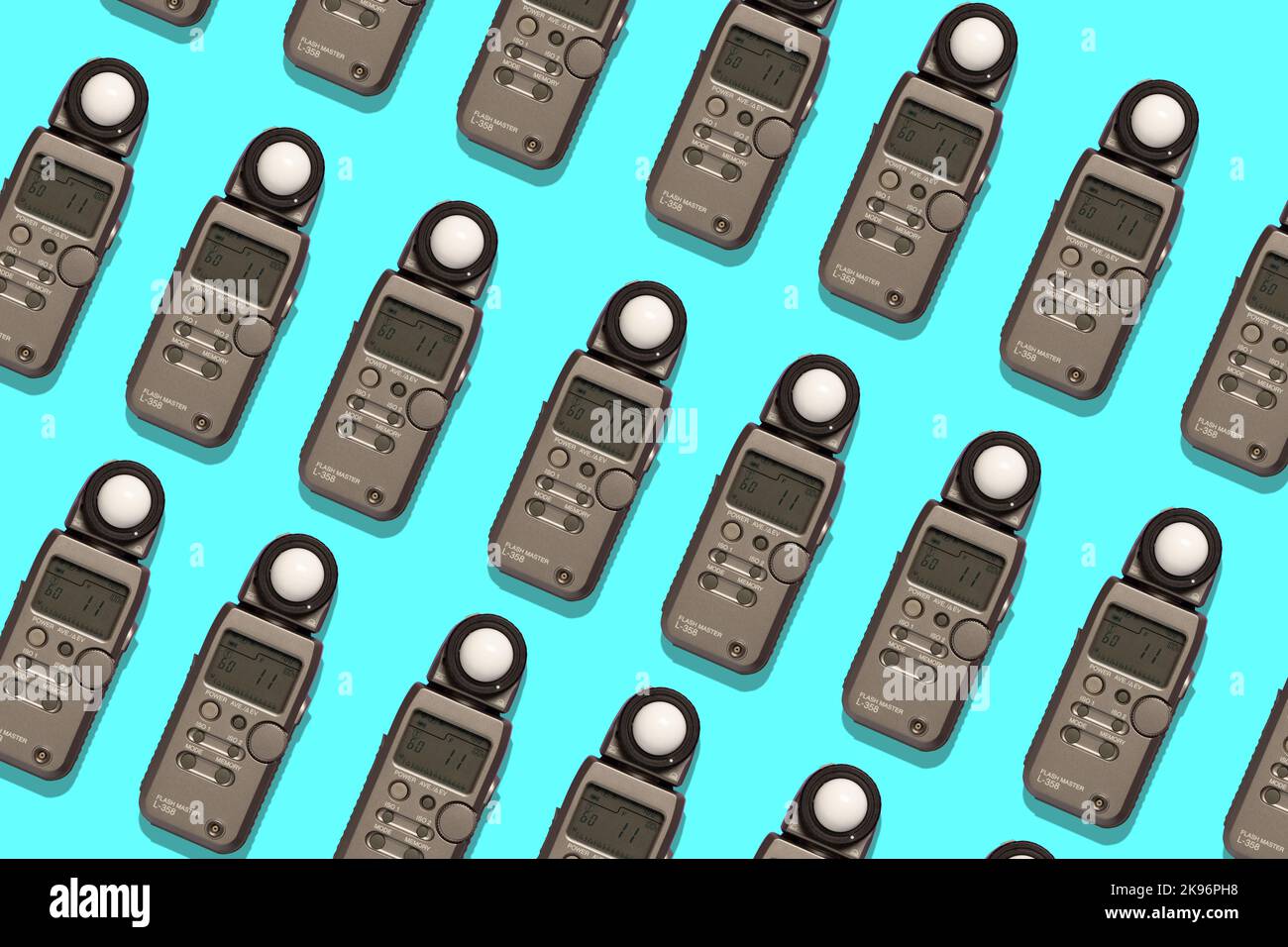 top view of a professional lightmeter on a colourful background ...