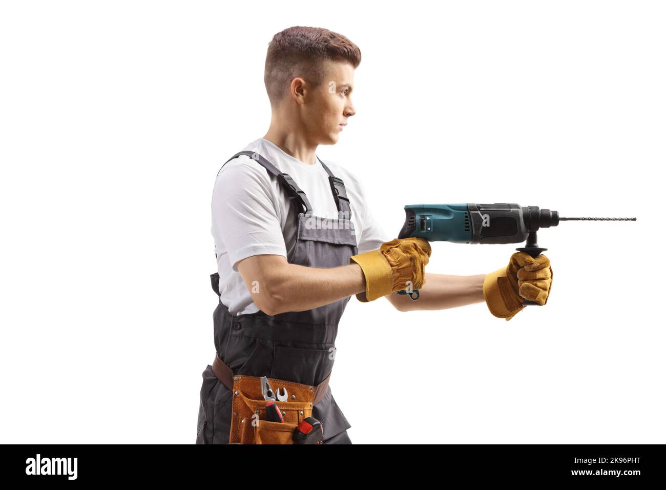 Worker drilling with a drill machine isolated on white background Stock ...