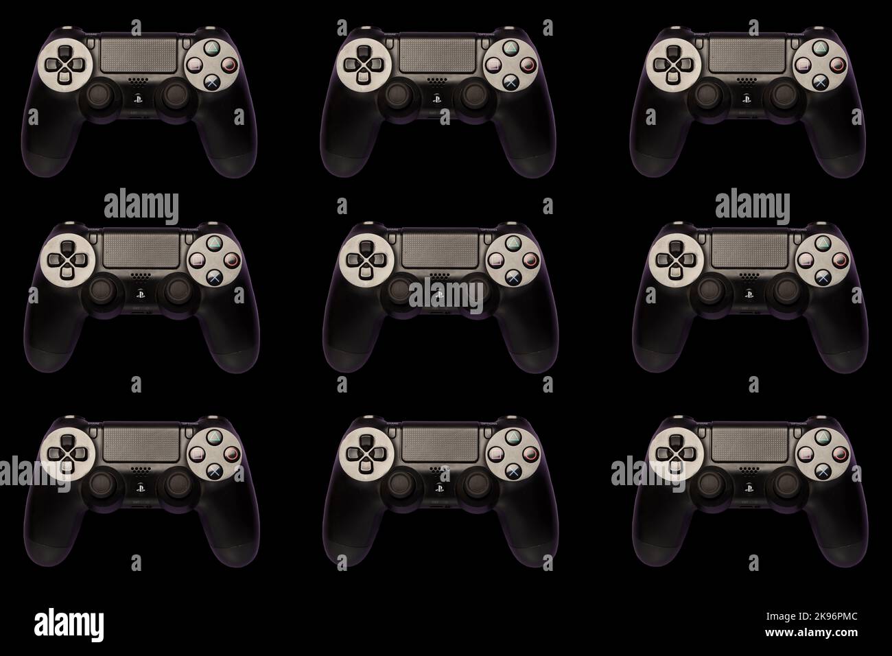 top view of playstation joypads on a colourful background, repetition ...