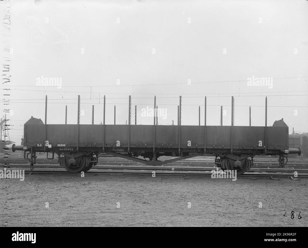 The State Railways, SJ o 35055. Open trolley with iron poles and ...