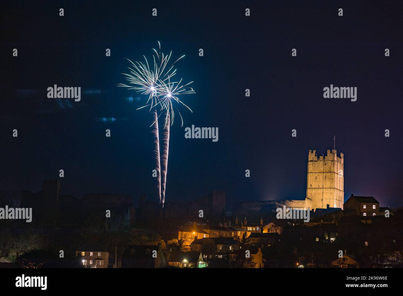 Fireworks display above Richmond Castle, North Yorkshire with houses in ...