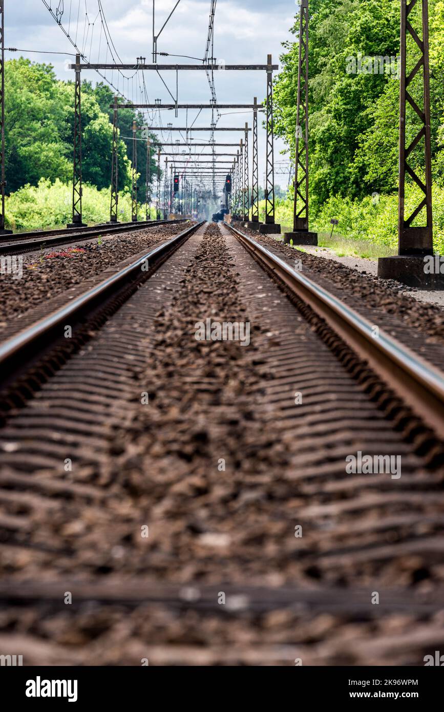 A vertical shot of railway tracks Stock Photo - Alamy