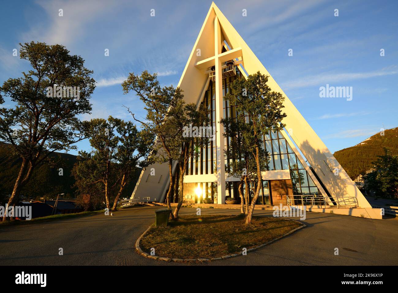 An abstract triangle building with a cross on the facade in Tromso ...